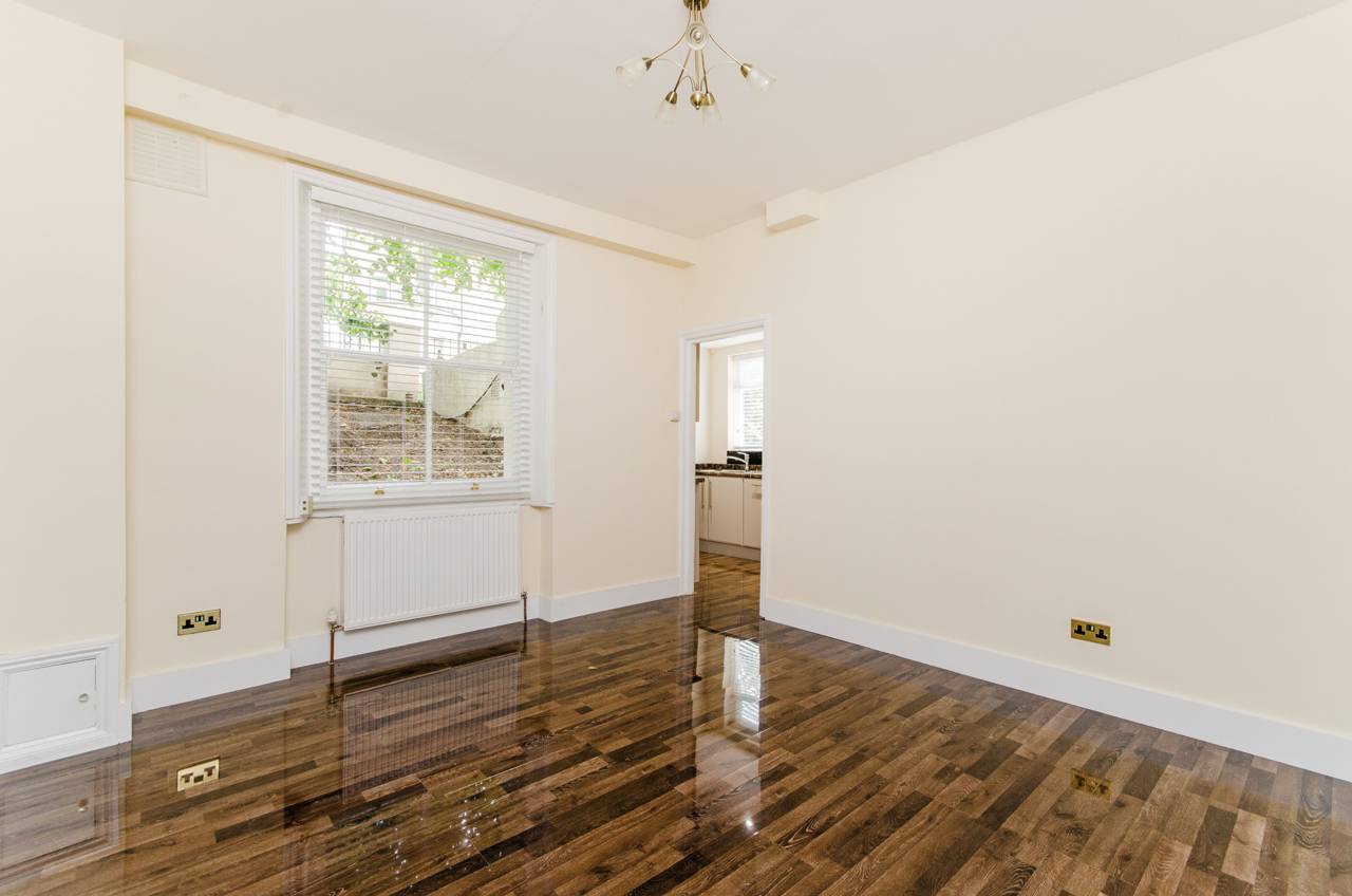 Rustic Champagne High-Gloss Laminate Flooring | Floorless Floors